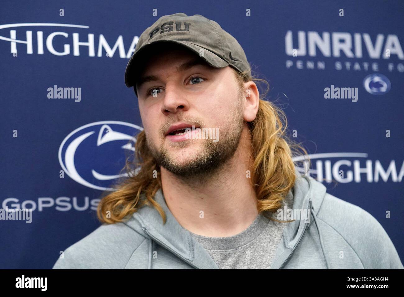 Penn State tight end Tyler Warren talks to reporters during the school ...