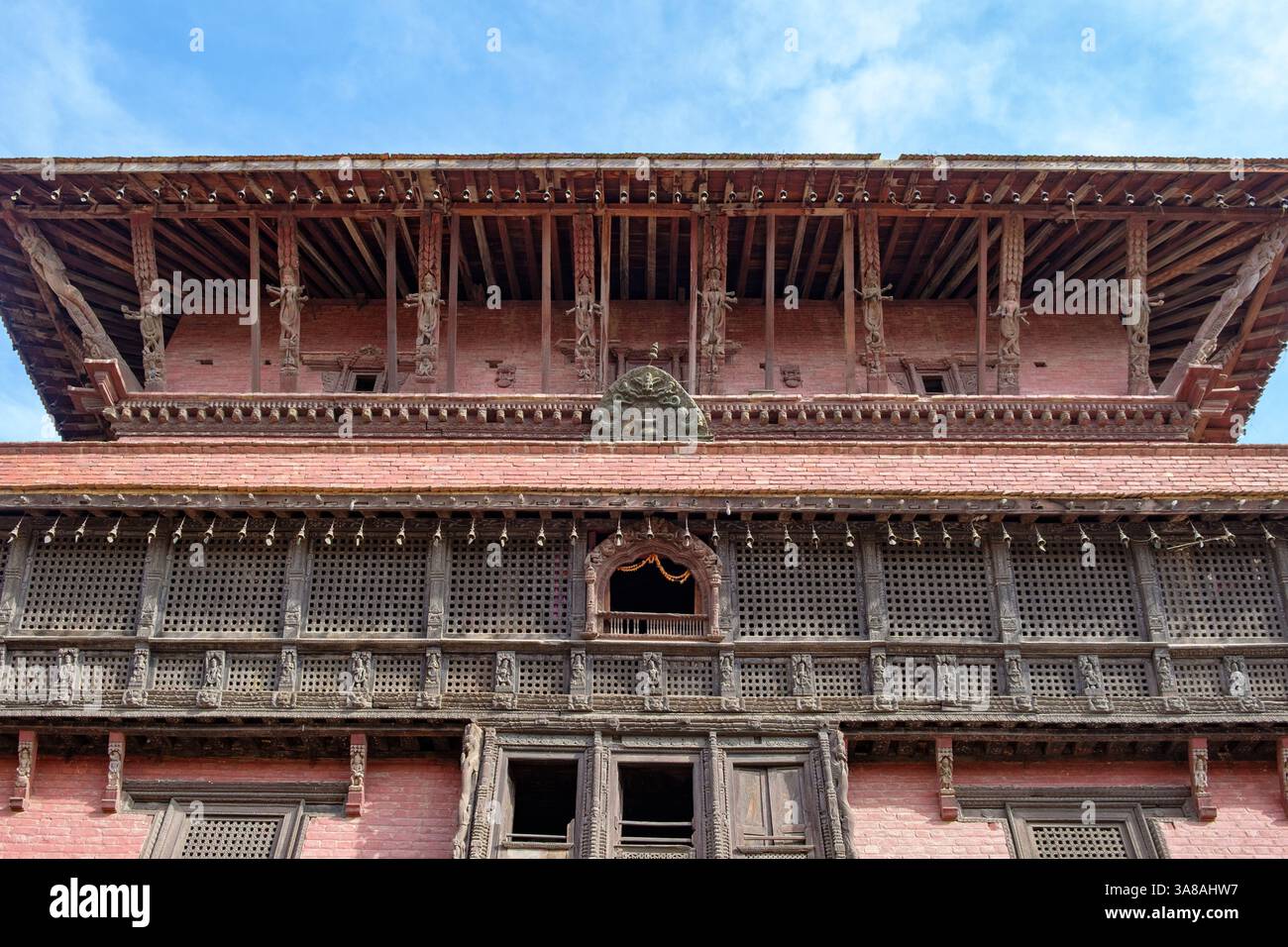 Intricate Newar wood carvings adorn a historic building in Nepal's ...