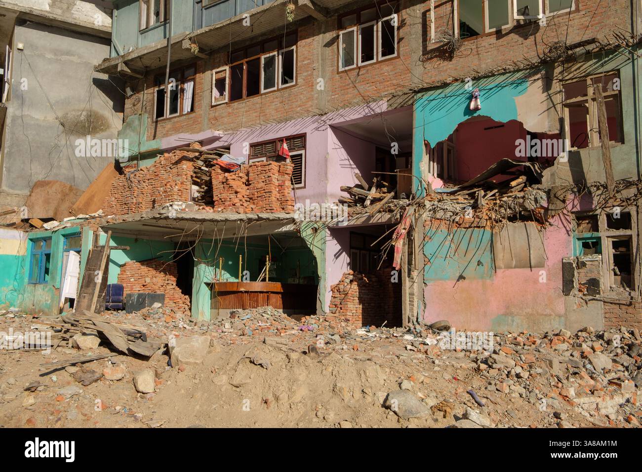 Buildings in Nepal lie in ruins, showing the devastating aftermath and destruction caused by an ...