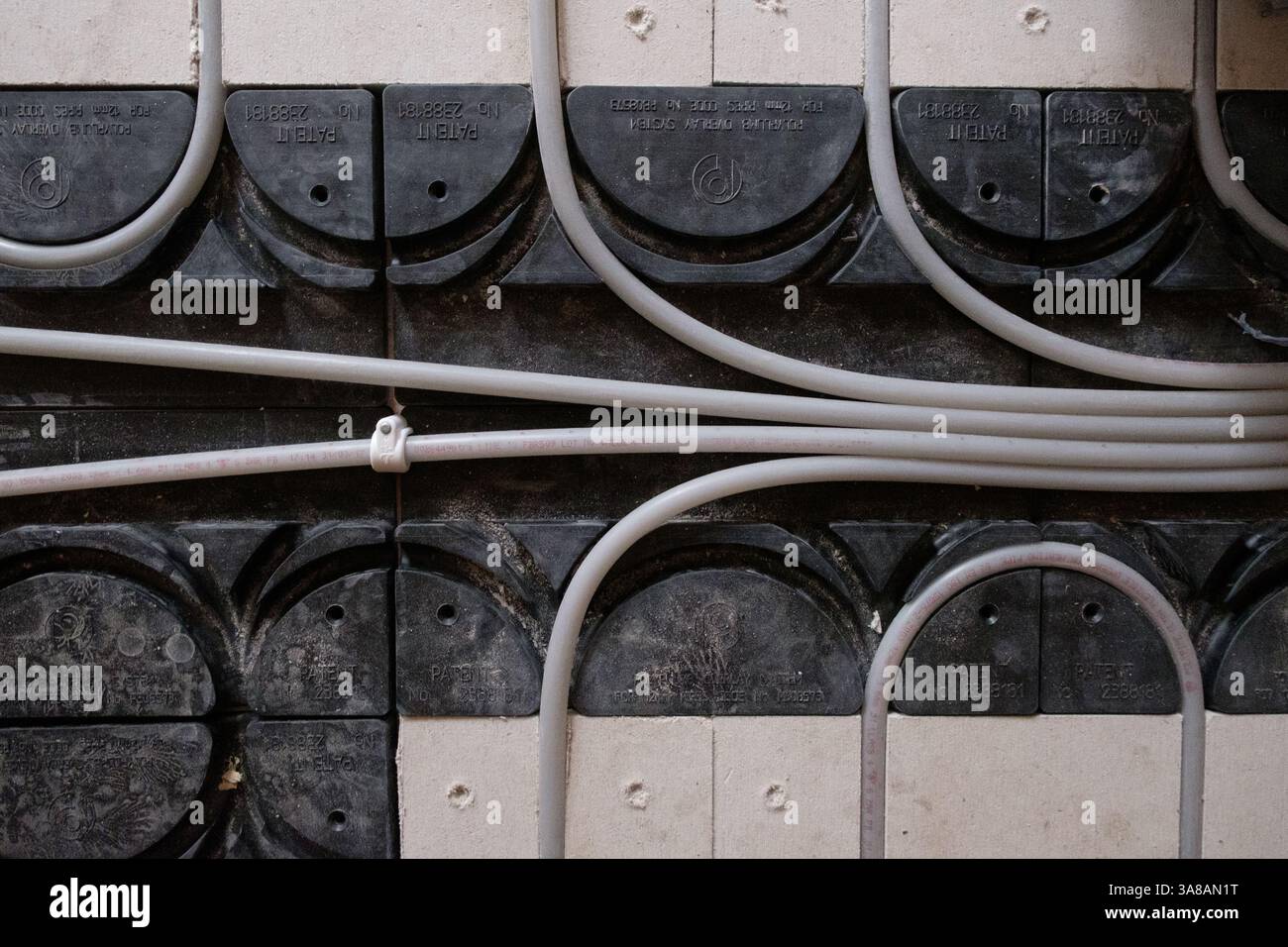Polyplumb 12mm pipes laid in an Overlay System base during underfloor ...