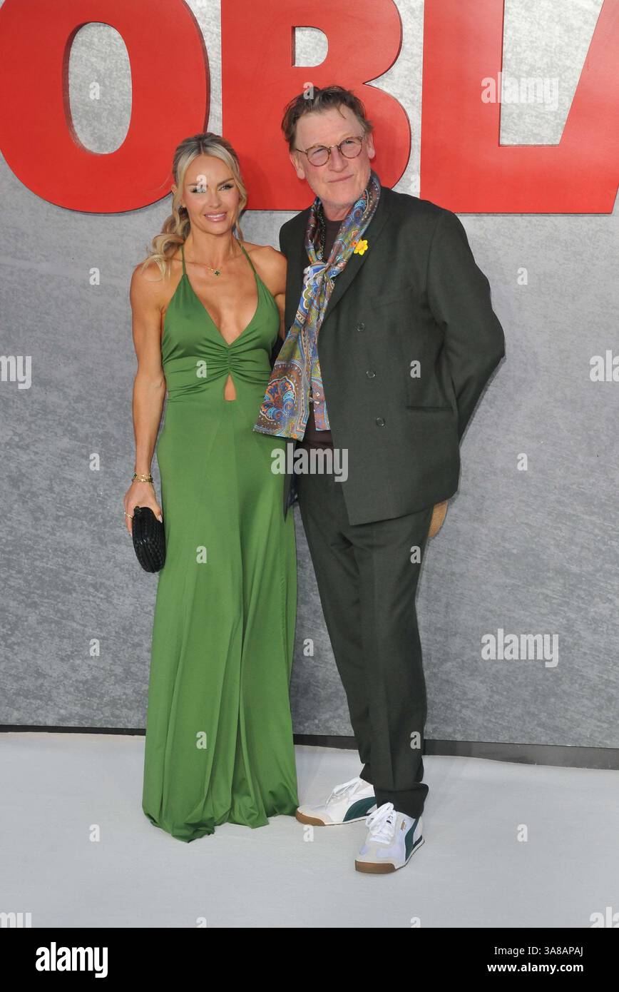 London, UK. 27th Mar, 2025. Annie Cooper and Geoff Bell at the "MobLand ...