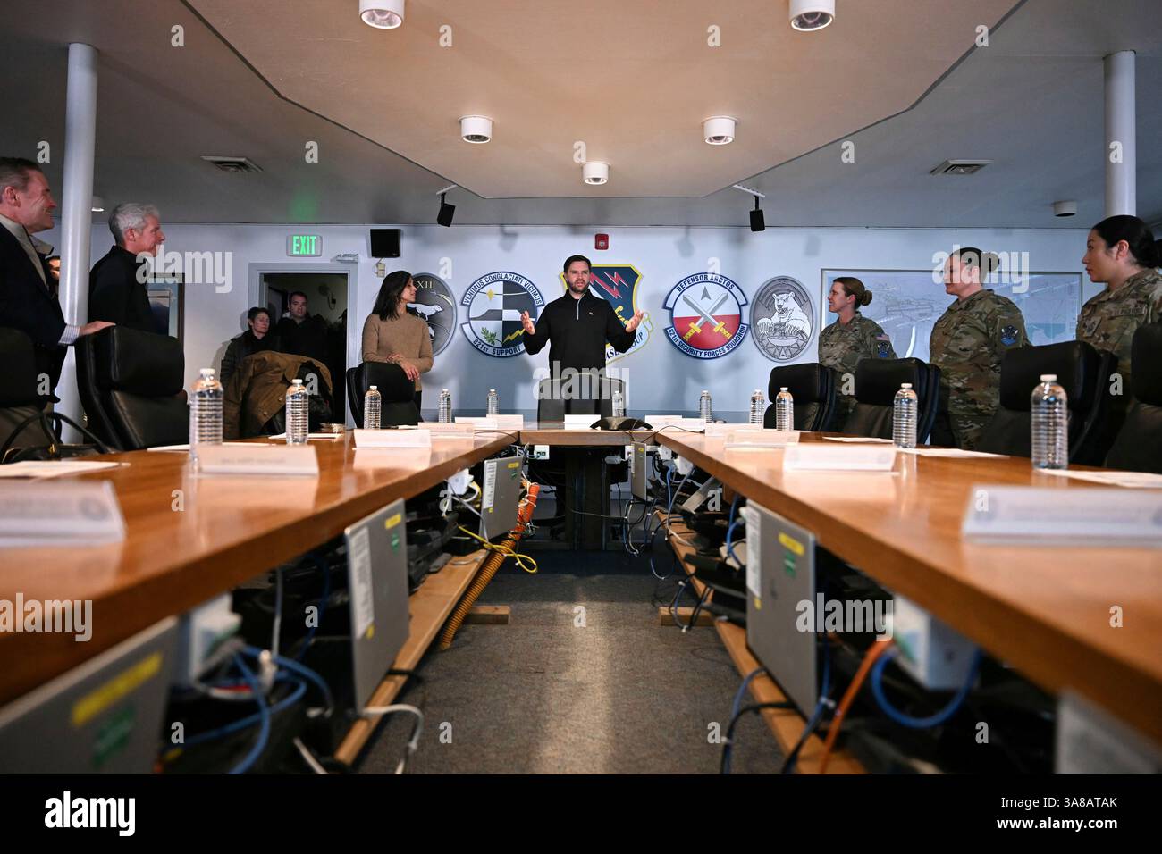 Vice President JD Vance, center, speaks as second lady Usha Vance ...