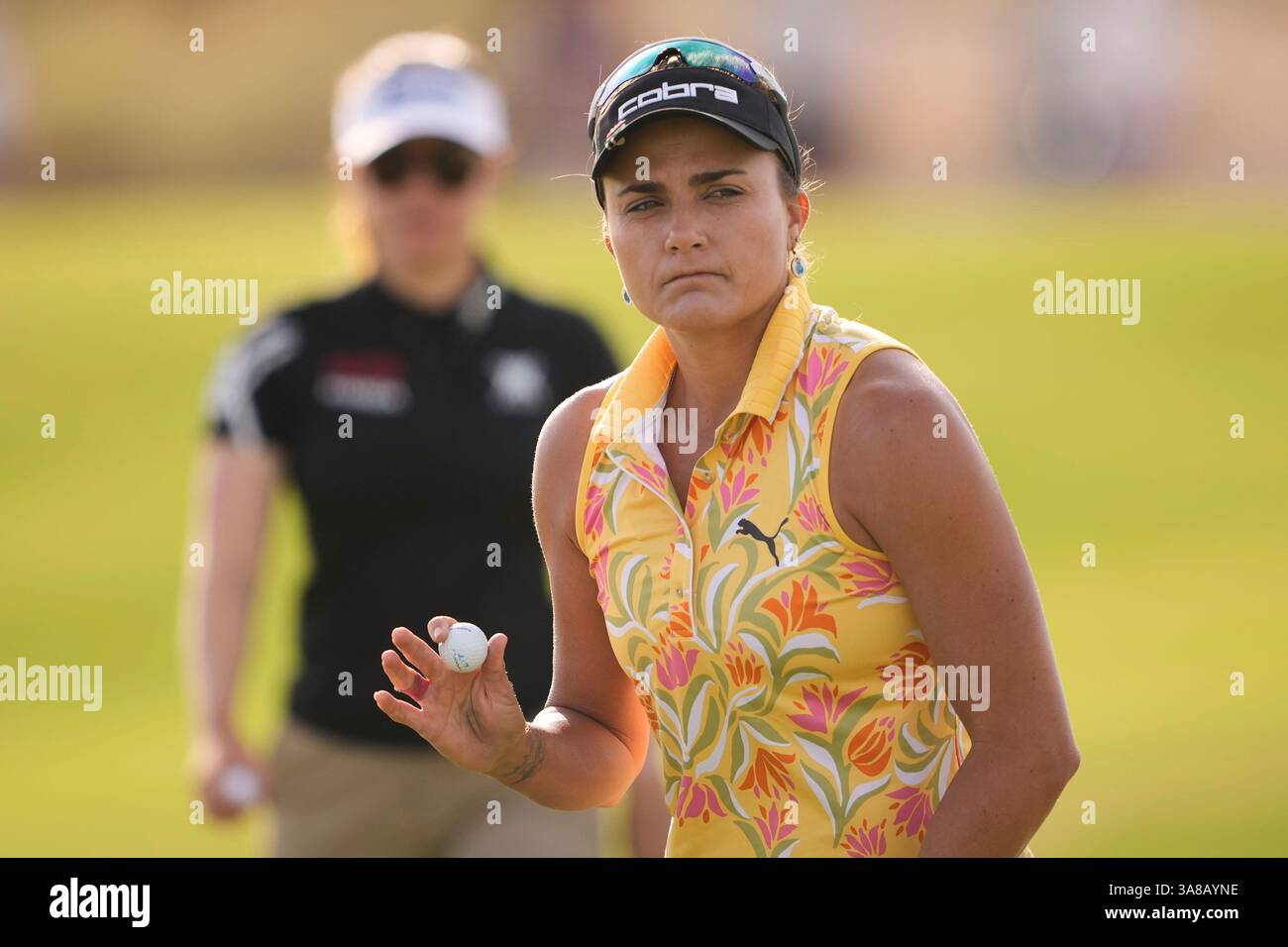 Lexi Thompson waves after her shot on the 12th green during the second ...