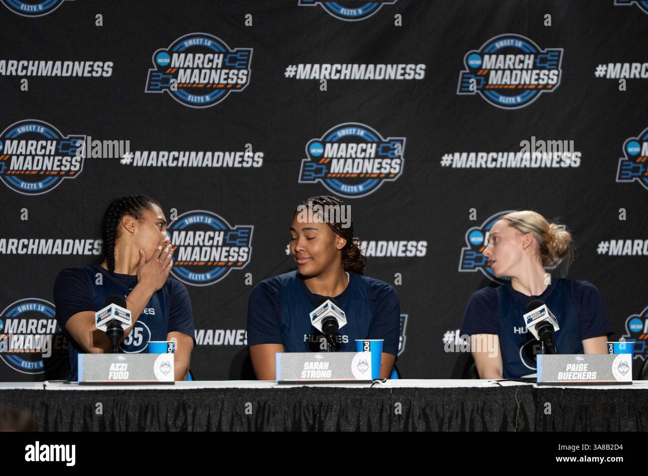 From left, UConn guard Azzi Fudd, forward Sarah Strong and guard Paige ...