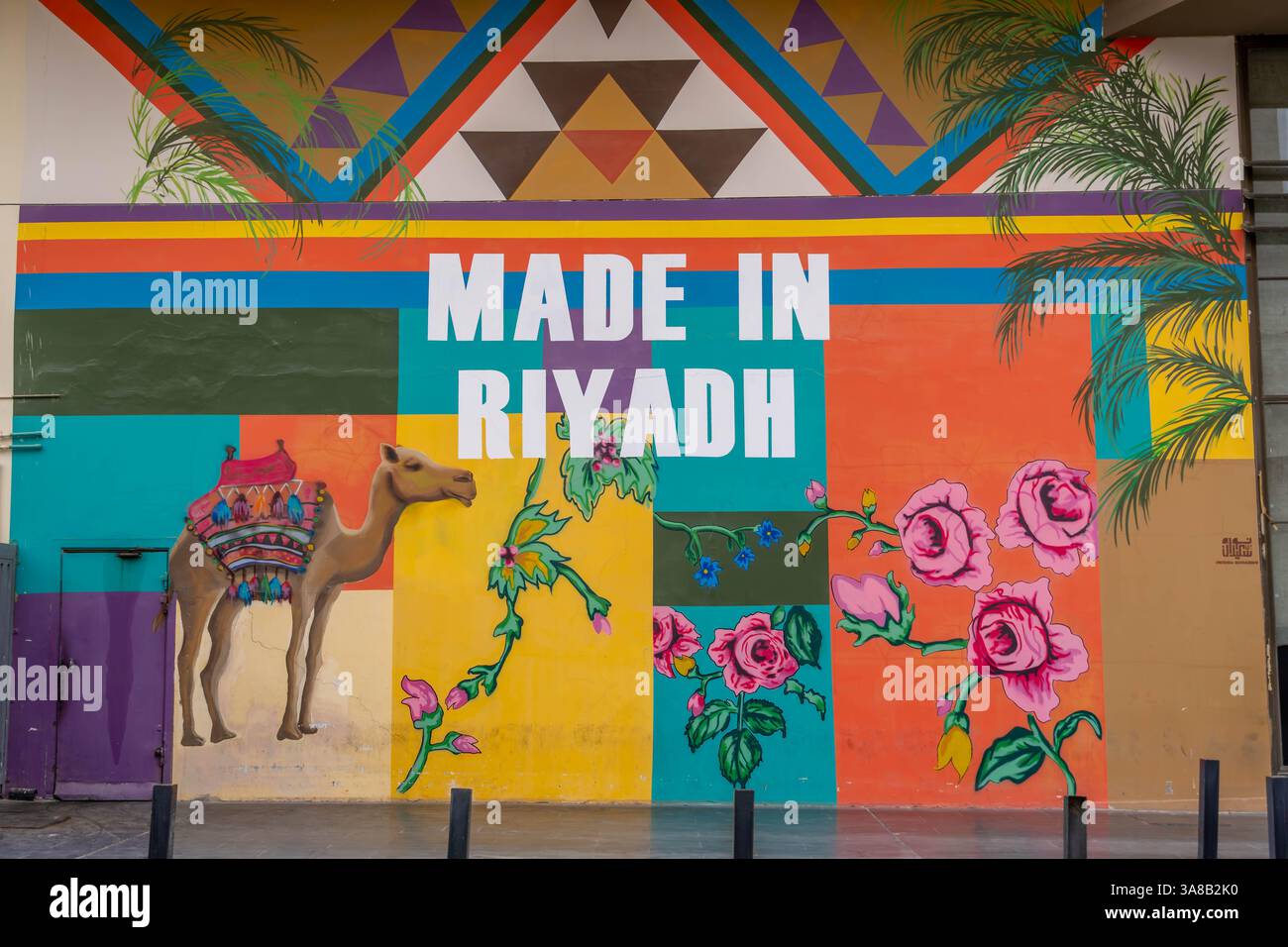 Art mural with words "Made in Riyadh" with the camel image and Arab ...