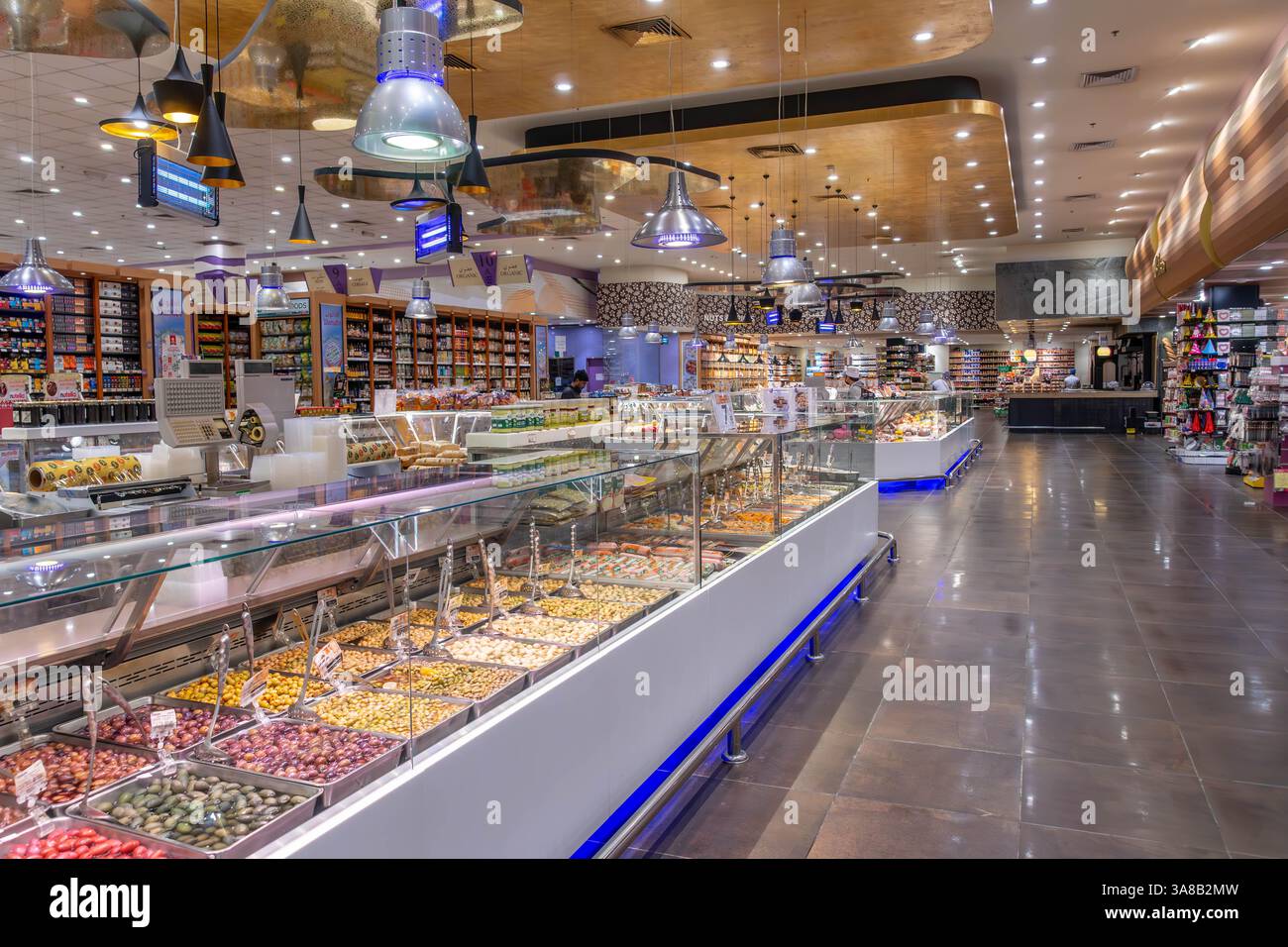 Supermarket with shelves displaying fresh produce, packaged food, and ...