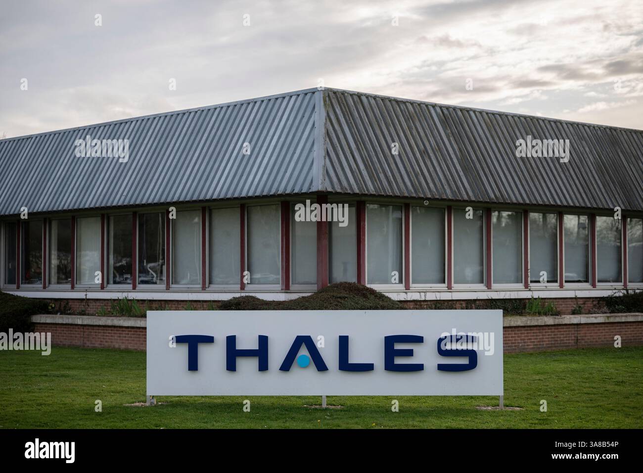 Pont Audemer, France. 28th Mar, 2025. Outside illustration of a Thales site, building and logo ...