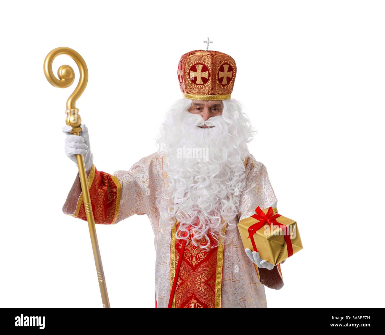Saint Nicholas with gift on white background Stock Photo - Alamy