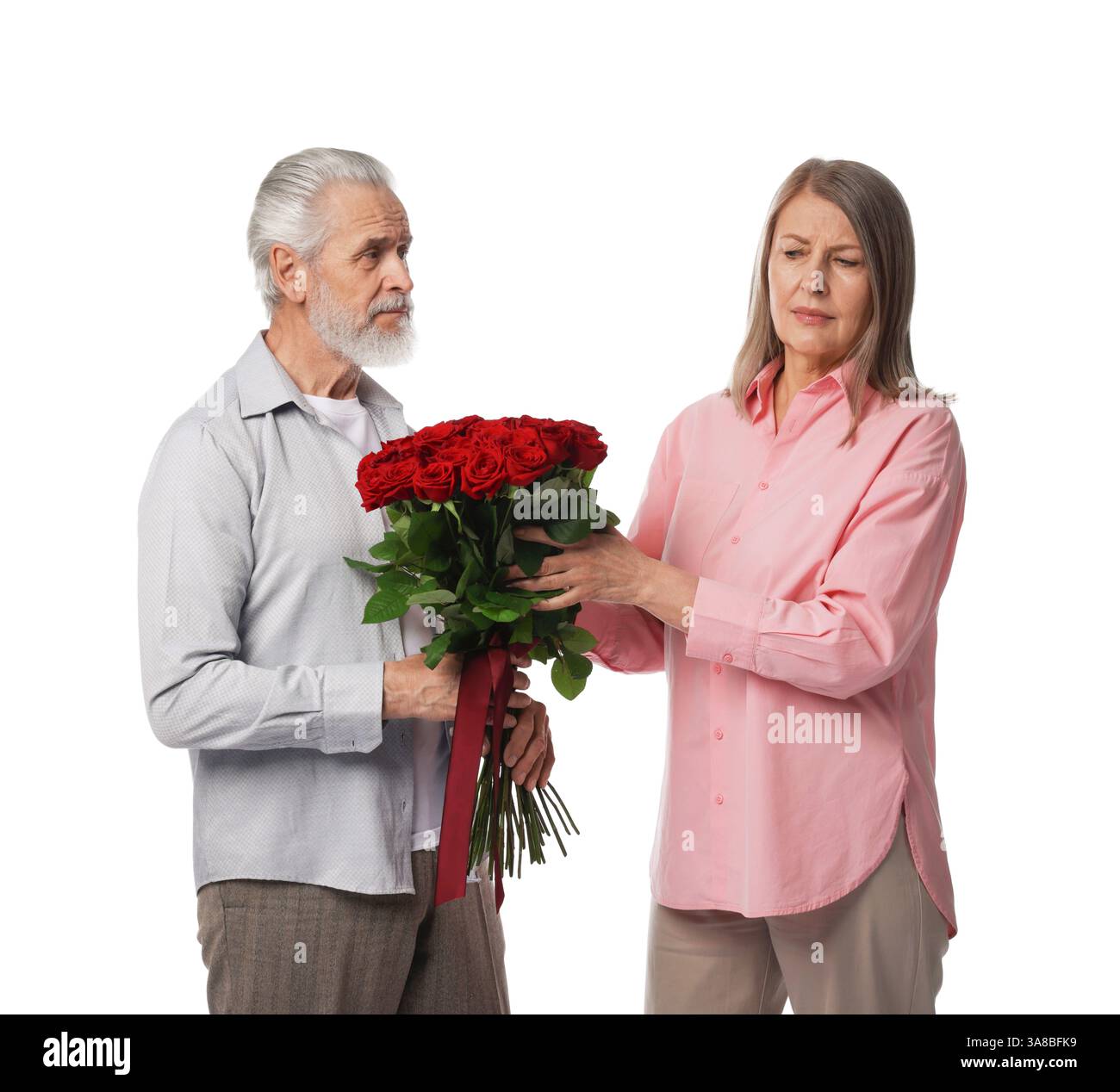 Dissatisfied woman refusing from man's bouquet of red roses on white ...
