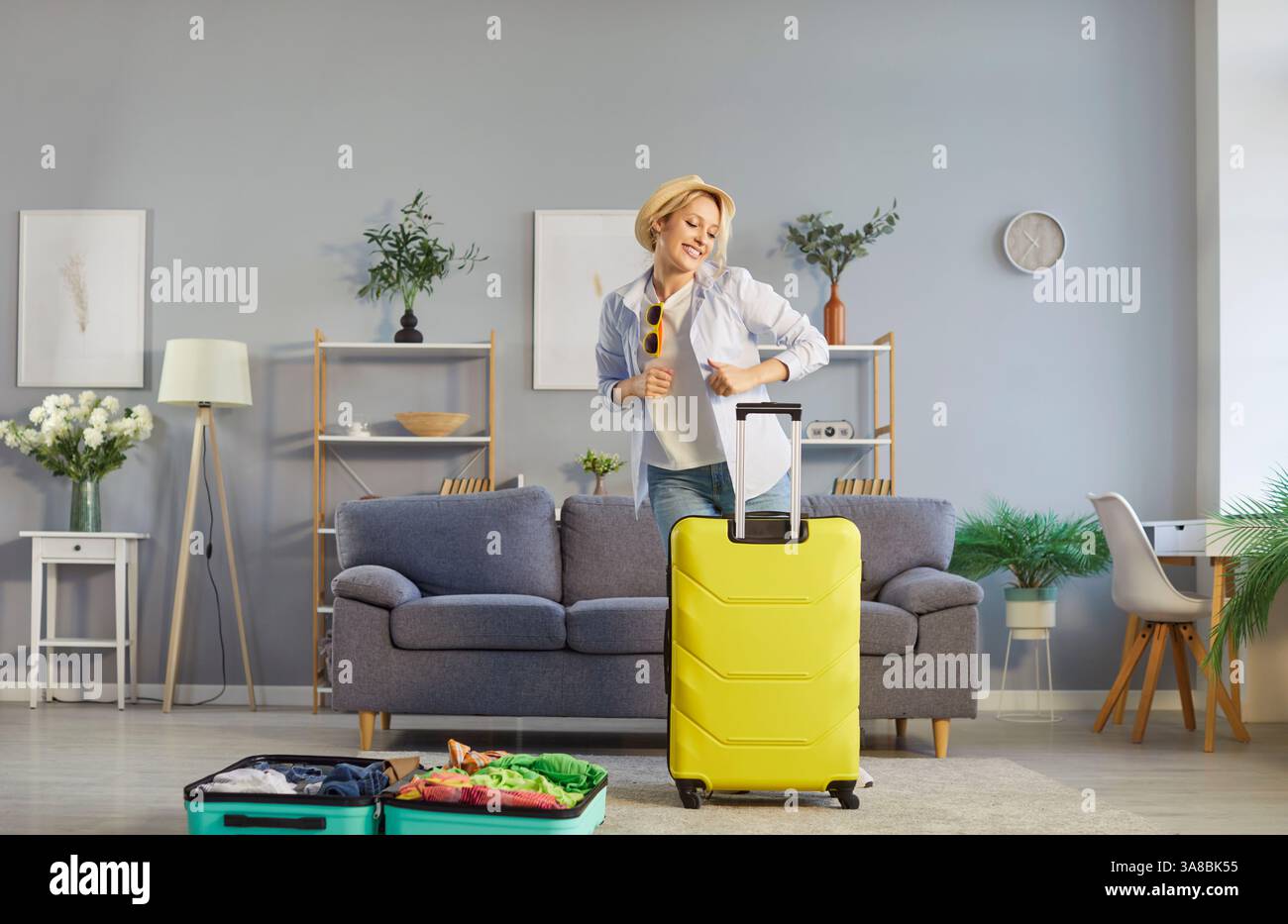 Cheerful woman traveler having upbeat mood as finally summer holidays ...