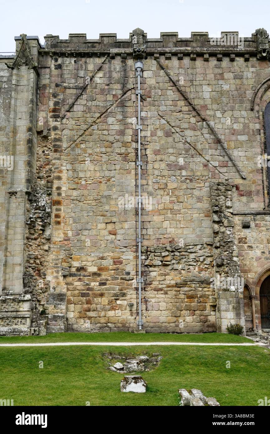 Detail of the stone wall at Bolton Priory with ancient marks where ...
