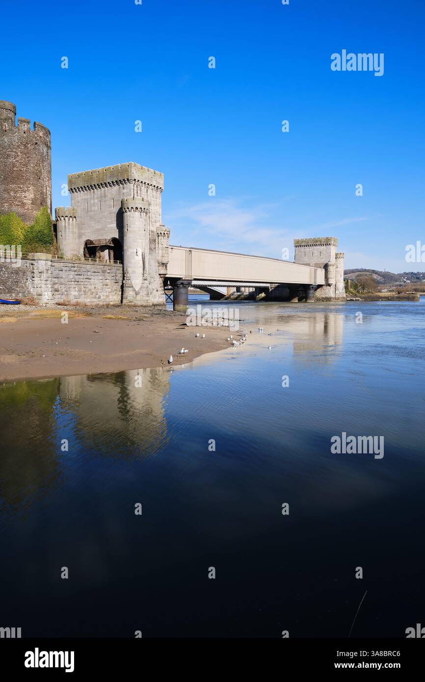 Railway bridge across the Conwy estuary in North Wales, designed in the ...
