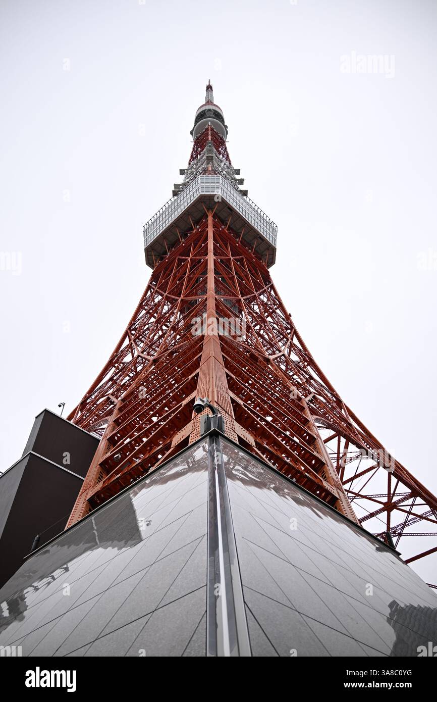 Tokyo Tower viewed from below on an overcast day in Tokyo, Japan – low ...