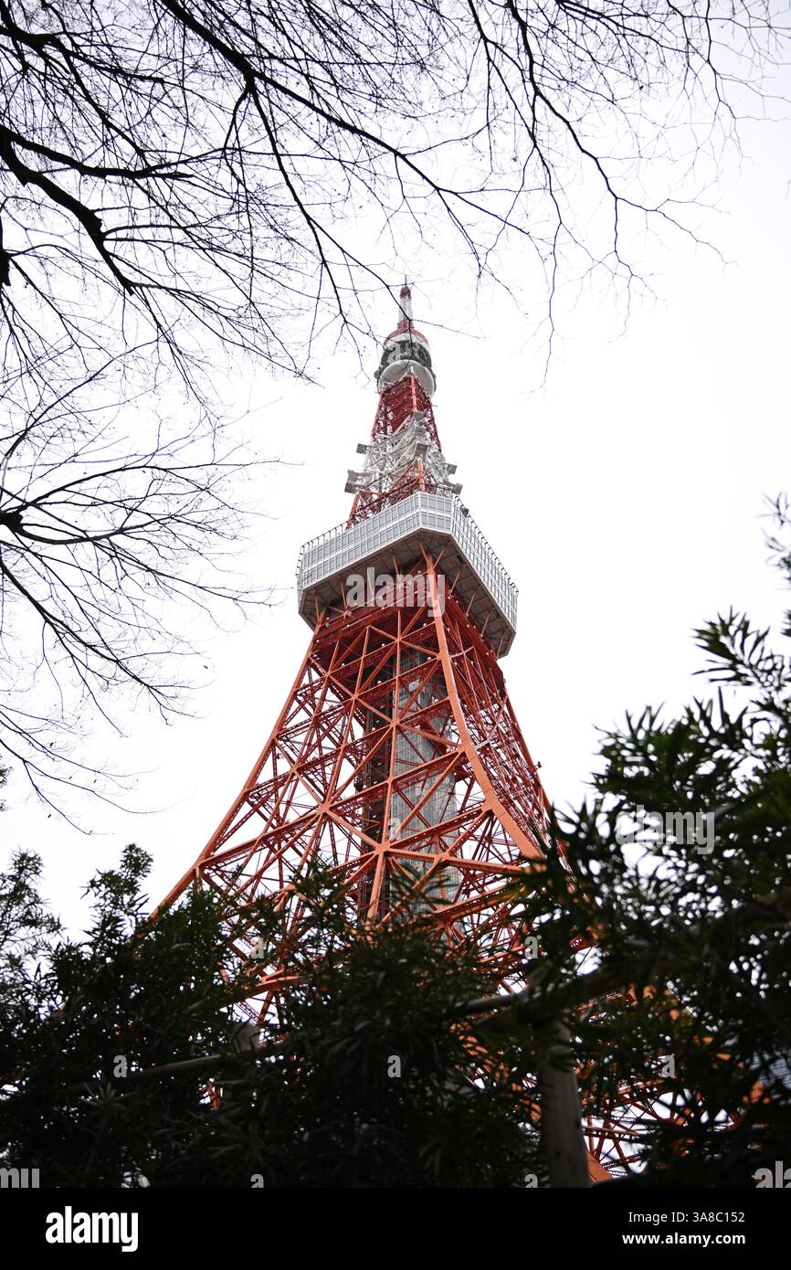 Tokyo Tower viewed from below on an overcast day in Tokyo, Japan – low ...
