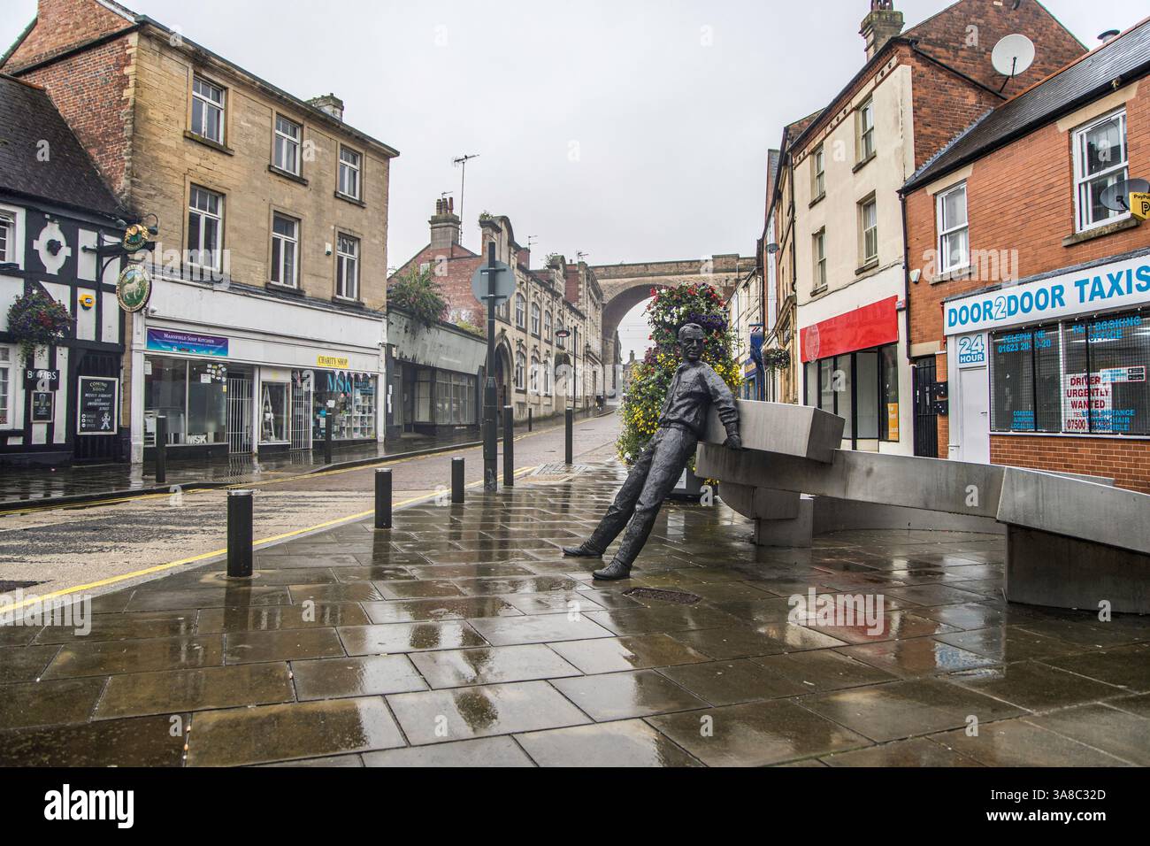 Mansfield , UK - August 8, 2023: Leaning mane statue street town ...