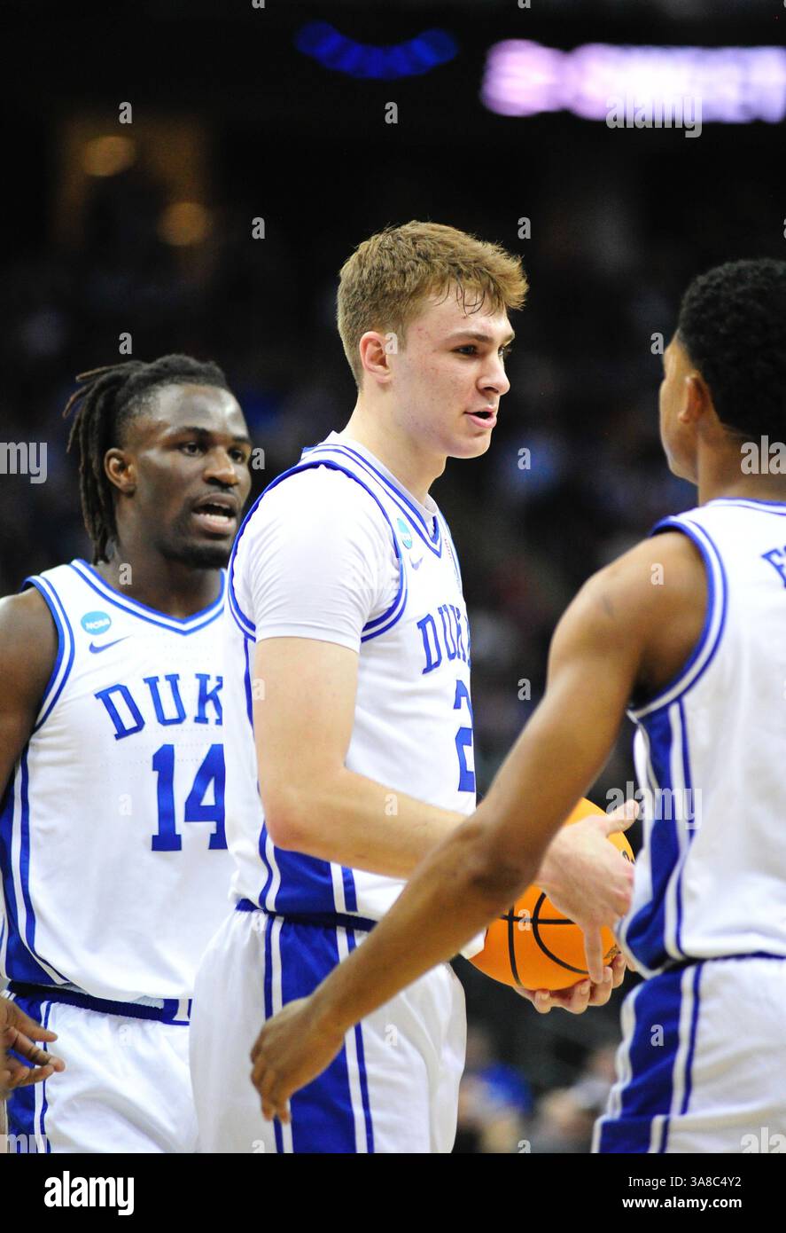 Newark, USA. 27th Mar, 2025. Duke's Cooper Flagg (2) and Sion James (14 ...