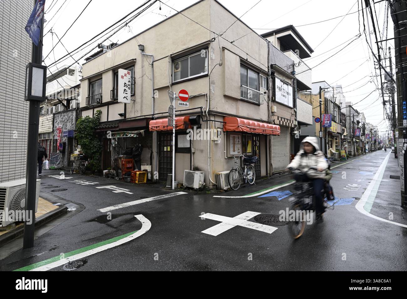 Rainy street scenes in Koenji, Tokyo, Japan – traditional shops ...