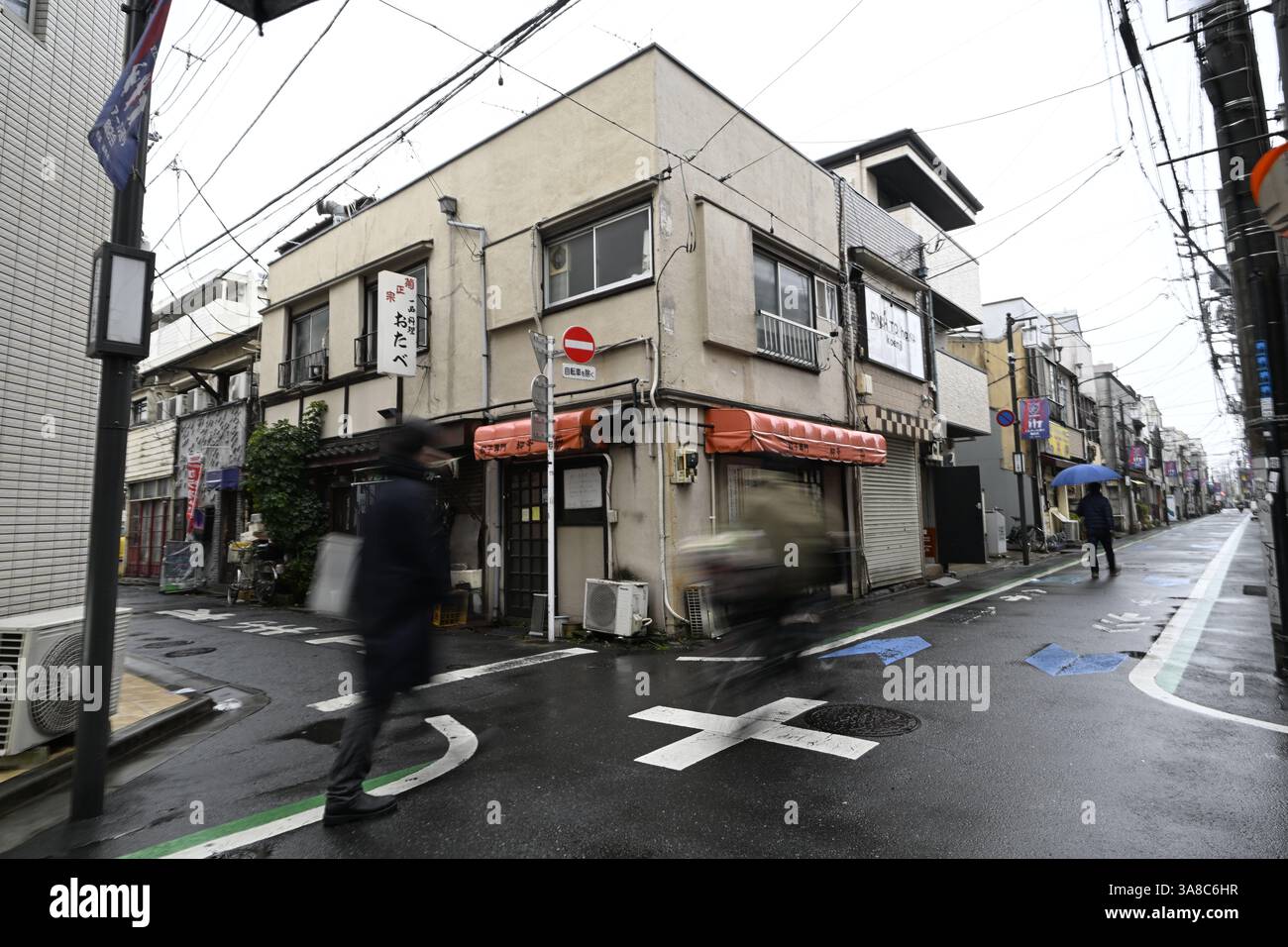 Rainy street scenes in Koenji, Tokyo, Japan – traditional shops ...