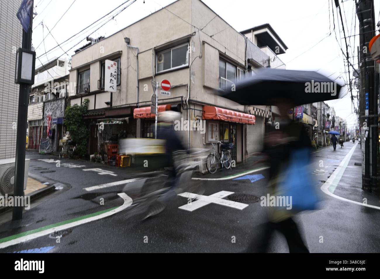 Rainy street scenes in Koenji, Tokyo, Japan – traditional shops ...