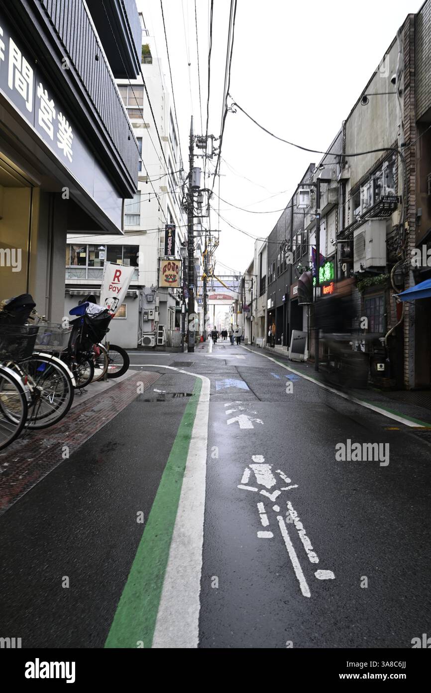 Rainy street scenes in Koenji, Tokyo, Japan – traditional shops ...