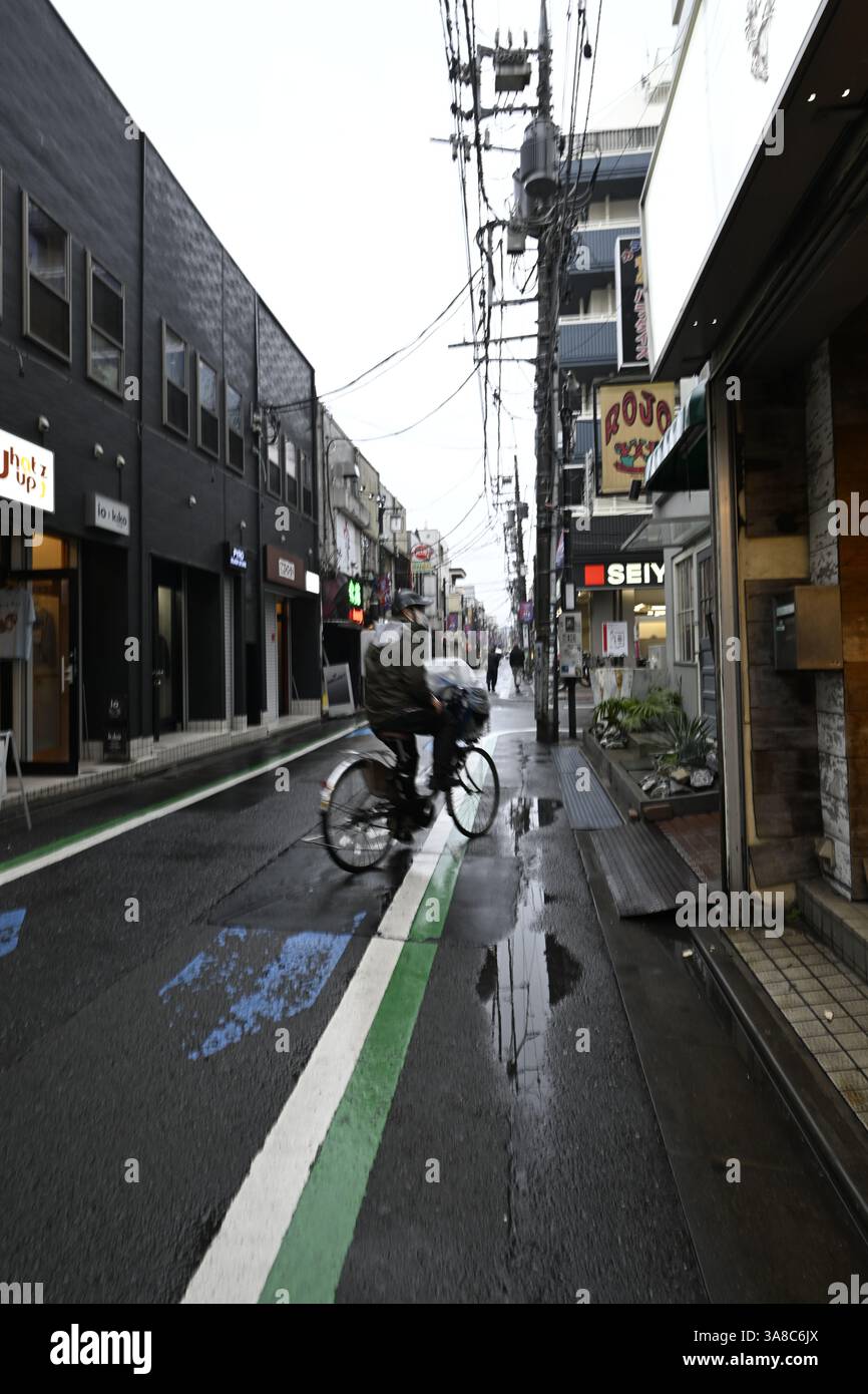 Rainy street scenes in Koenji, Tokyo, Japan – traditional shops ...