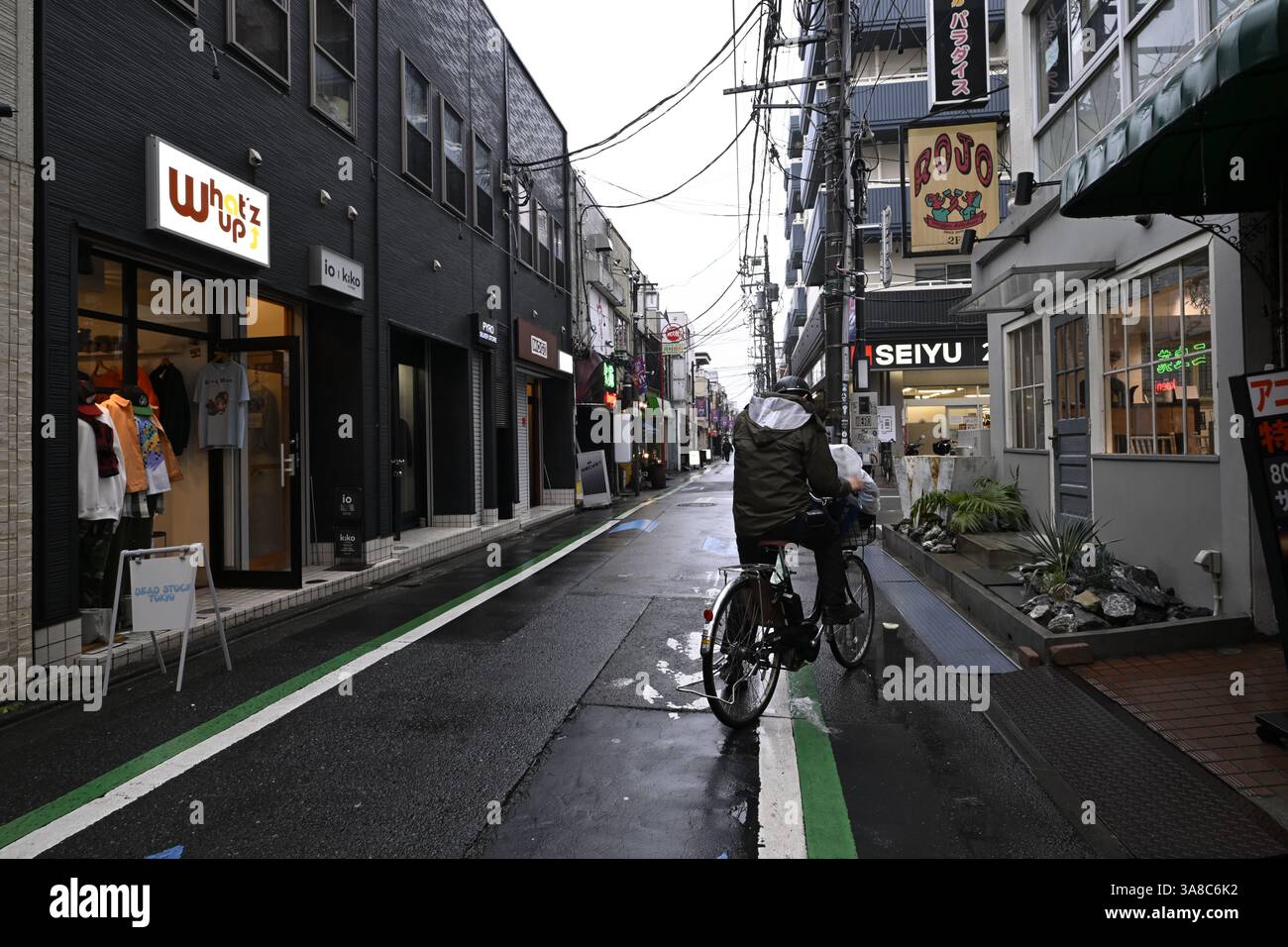Rainy street scenes in Koenji, Tokyo, Japan – traditional shops ...