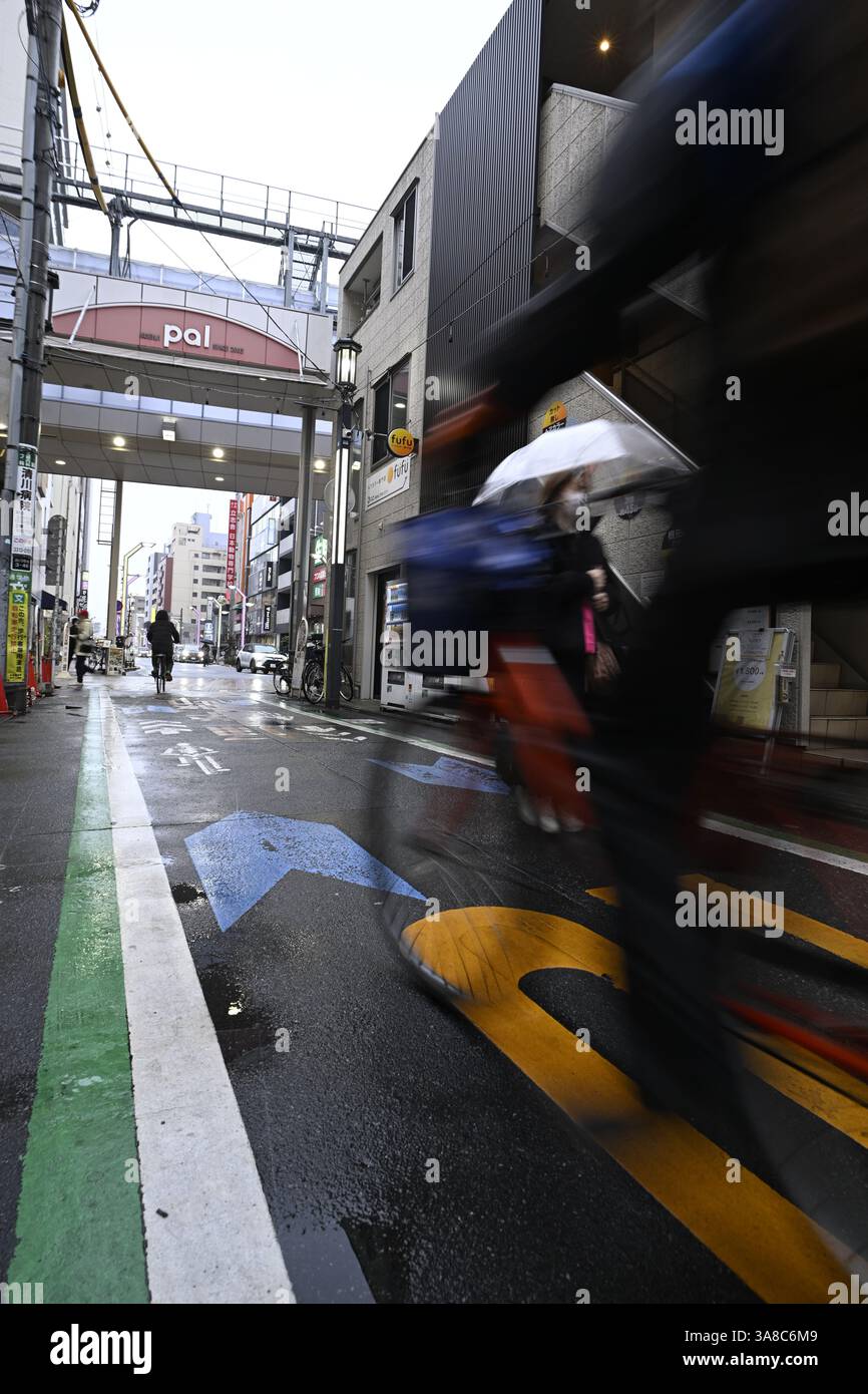 Rainy street scenes in Koenji, Tokyo, Japan – traditional shops ...