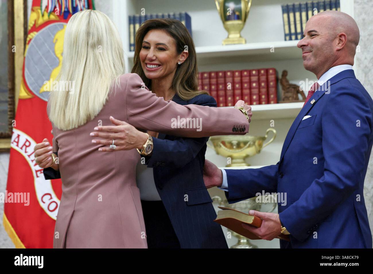 Attorney General Pam Bondi hugs Alina Habba, with husband Gregg Reuben ...