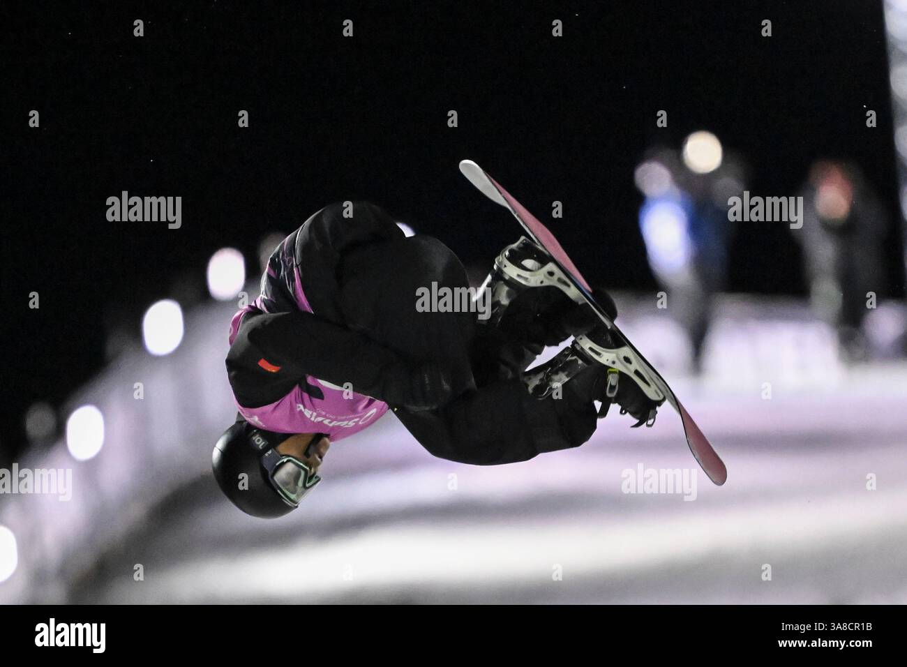 Wenlong Yang, of China, in action during the snowboard big air ...