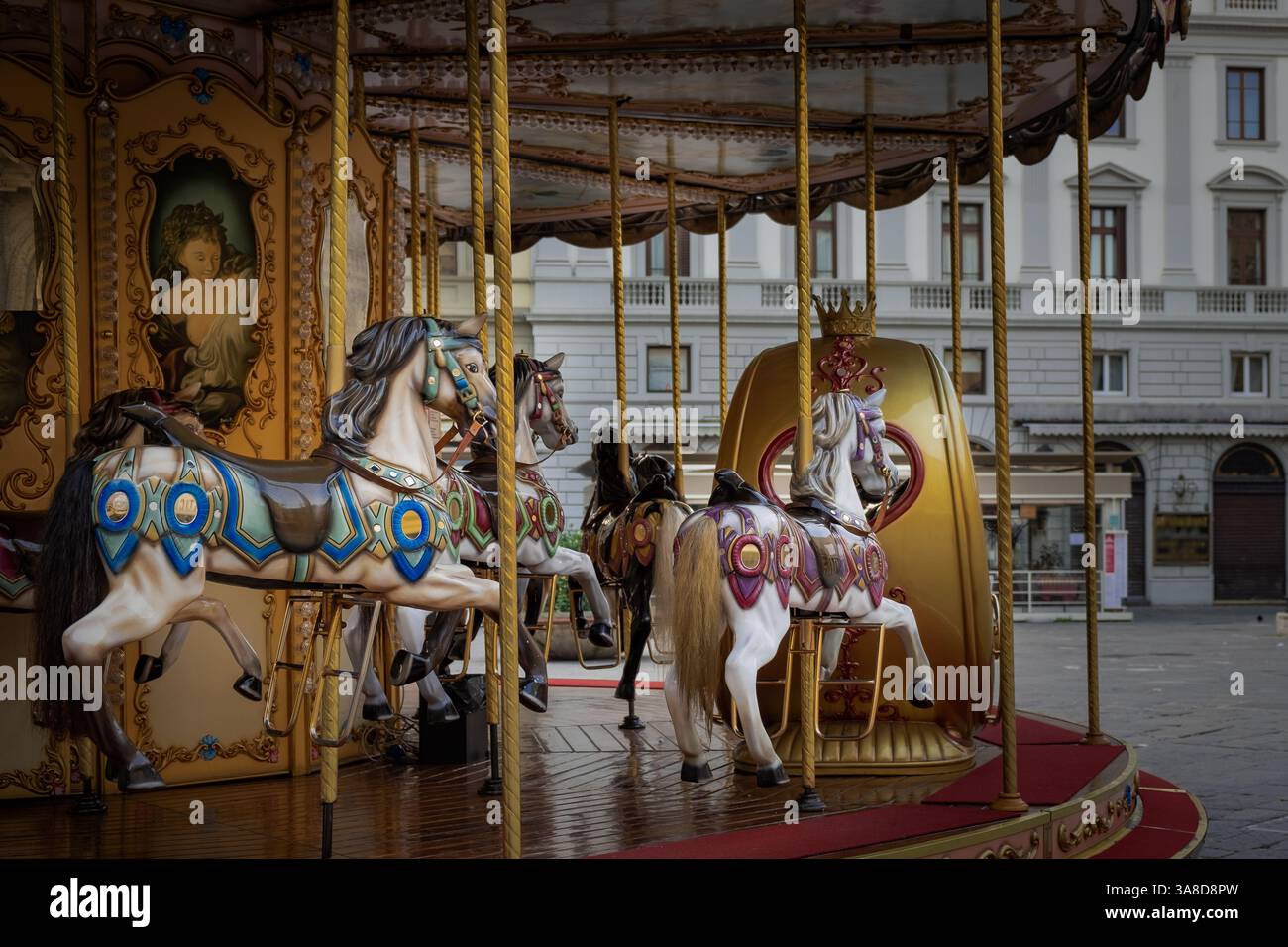 Carusel in a public square of Florence, Italy Stock Photo - Alamy