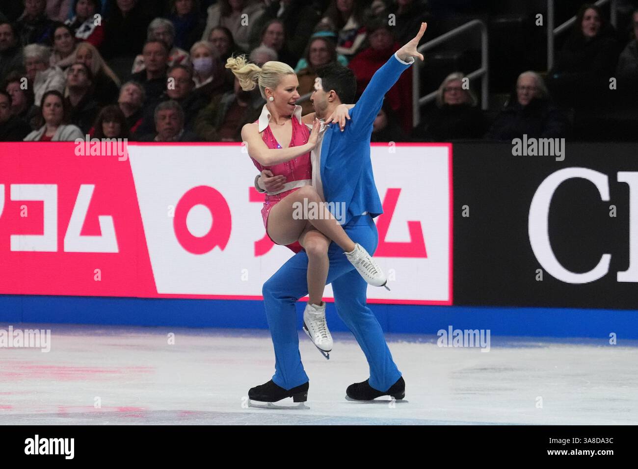 Marjorie Lajoie and Zachary Lagha, of Canada, perform during the ice ...