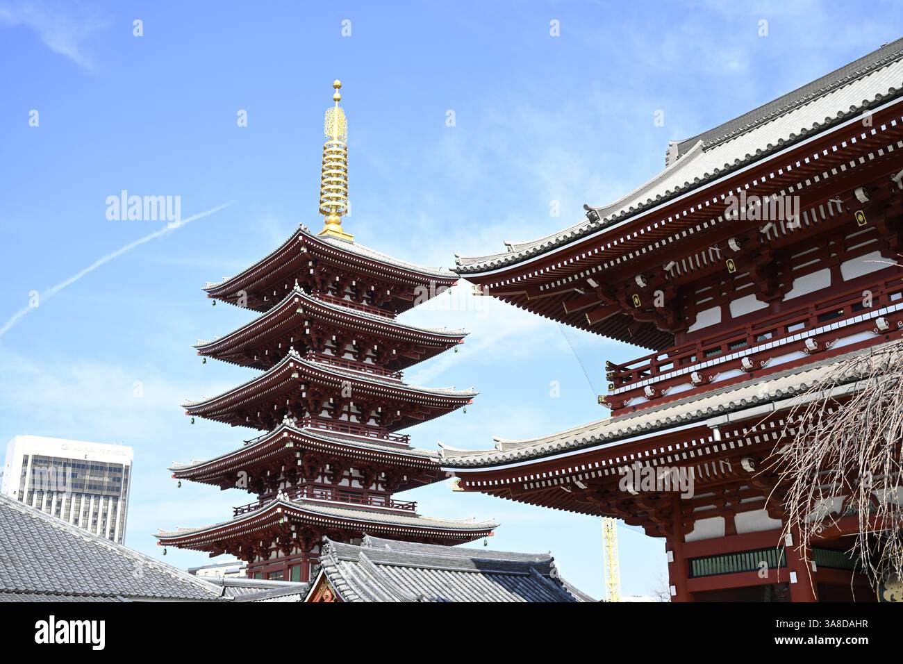 Traditional Japanese pagoda and temple roof at Senso-ji Temple in Asakusa, Tokyo, Japan – blue ...