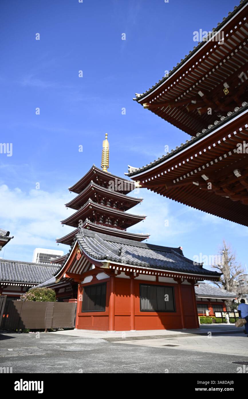 Traditional Japanese pagoda and temple roof at Senso-ji Temple in ...