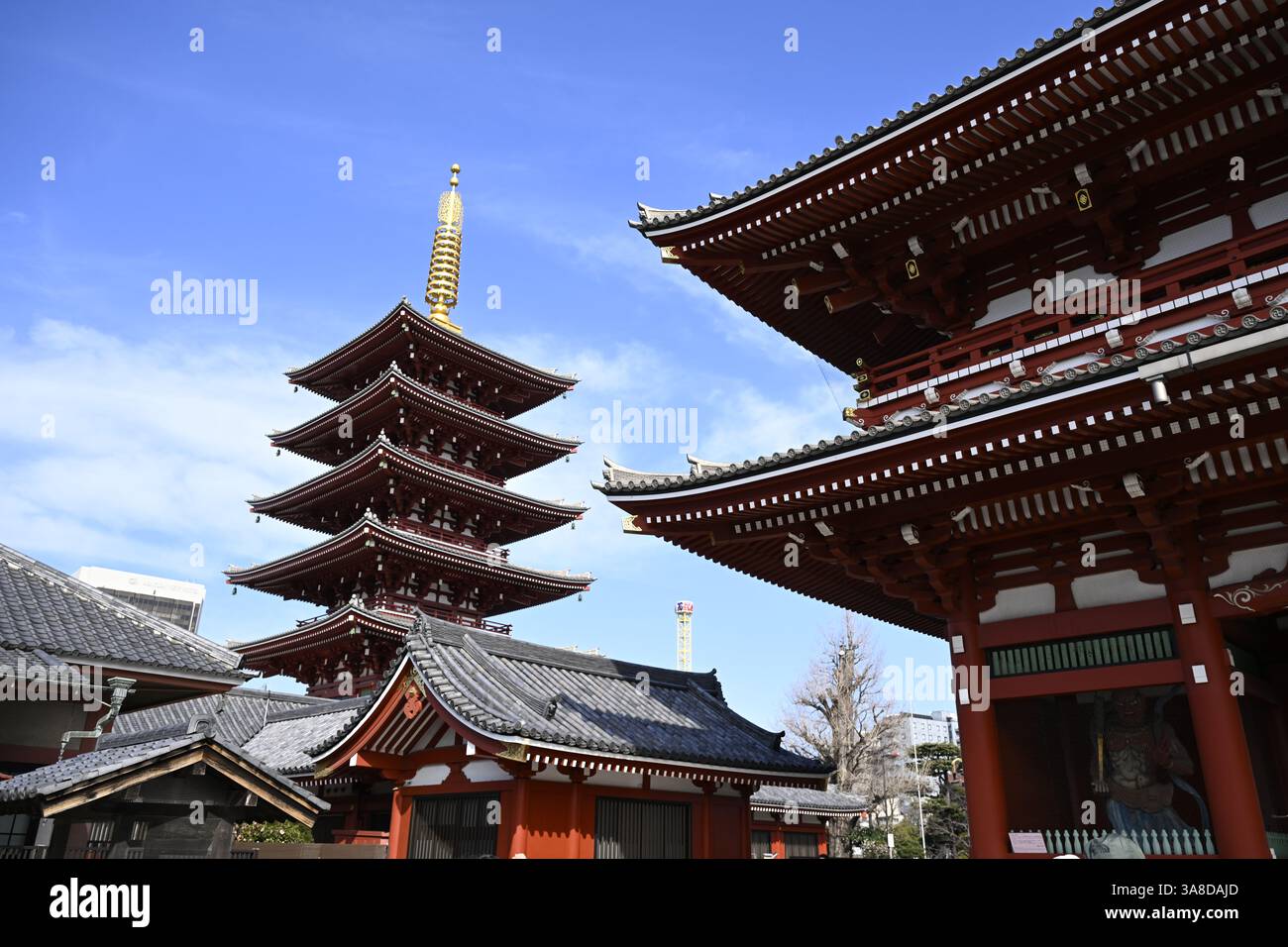 Traditional Japanese pagoda and temple roof at Senso-ji Temple in ...