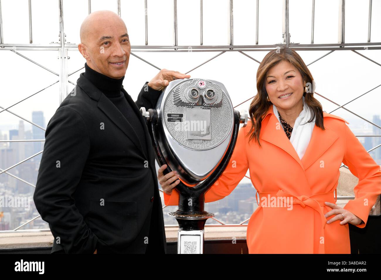 New York, USA. 28th Mar, 2025. Juju Chang (R) and Byron Pitts visit the Empire State Building in ...