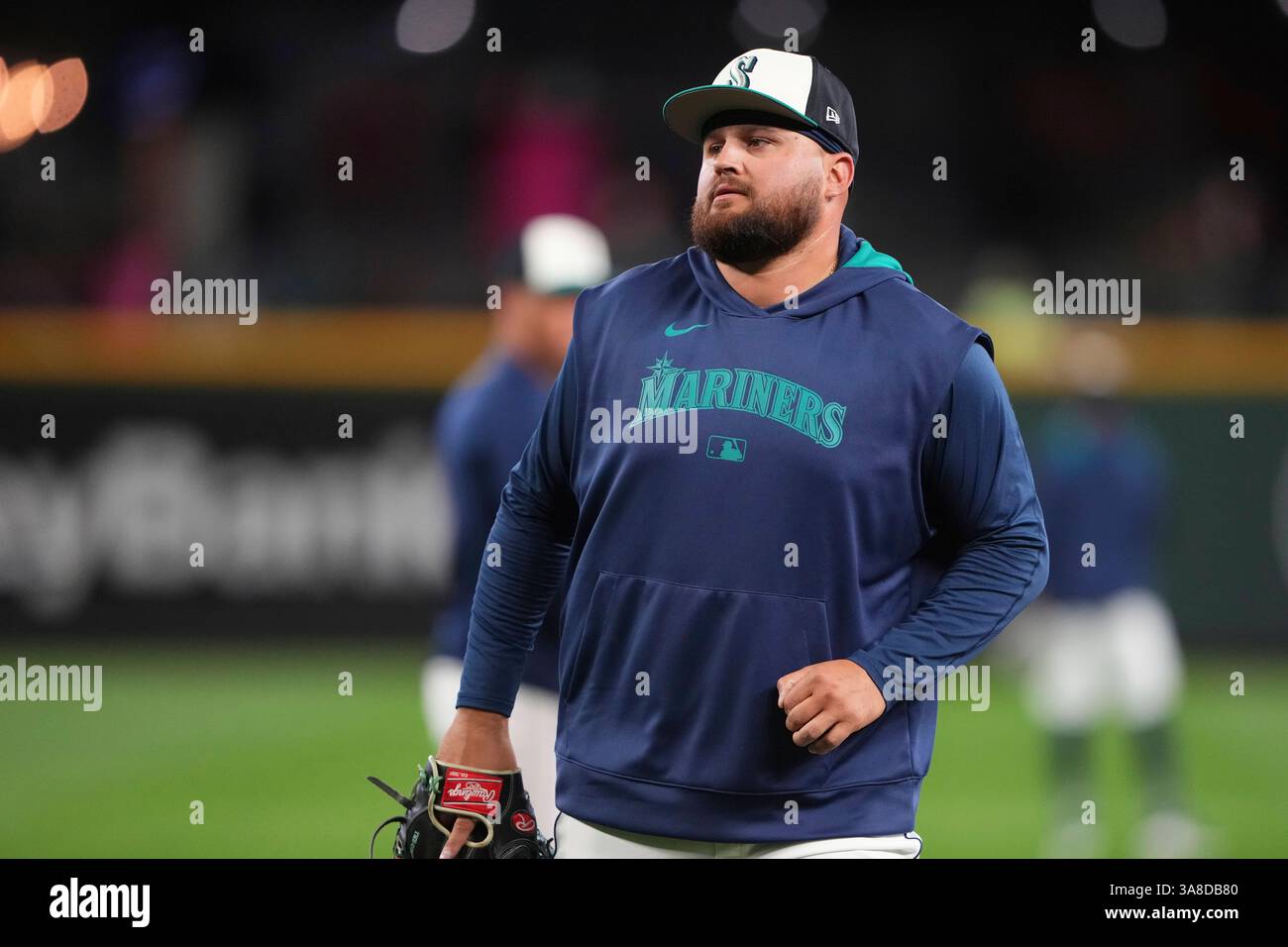 Seattle Mariners first baseman Rowdy Tellez warms up before an opening ...