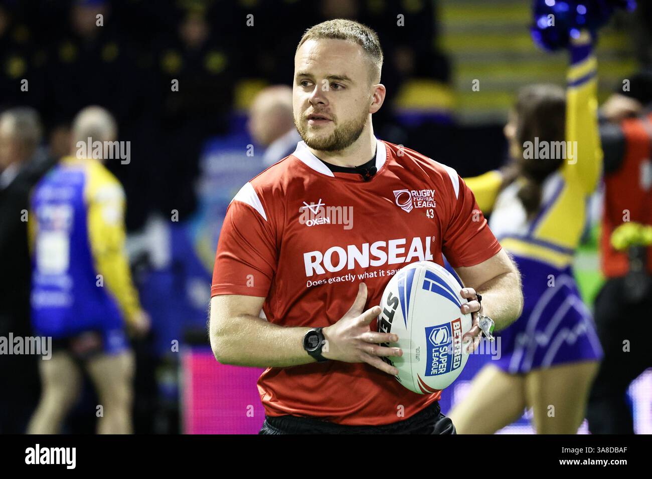 Warrington, UK. 28th Mar, 2025. Referee Tom Grant walks out with the ...