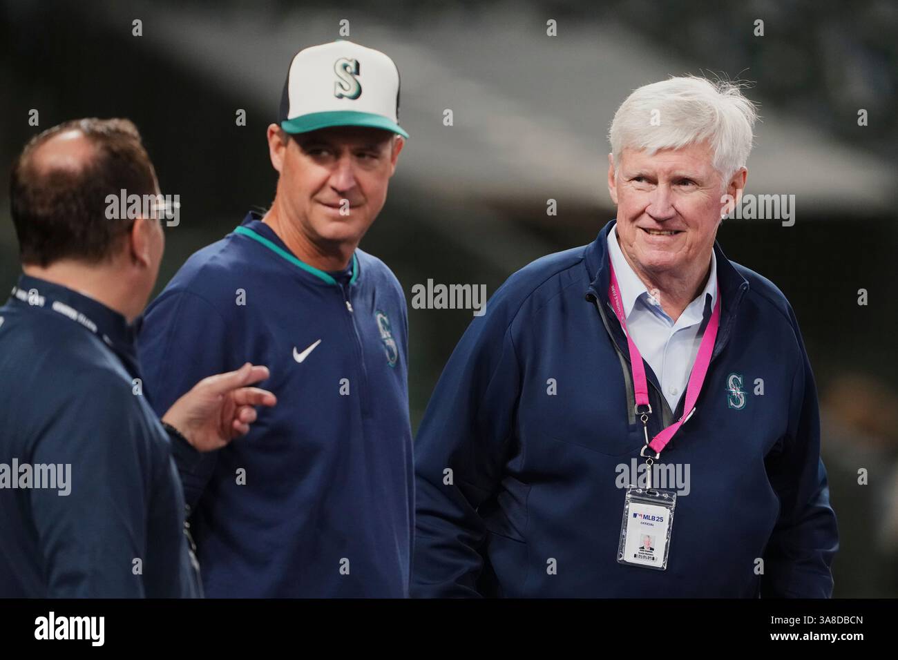 Seattle Mariners president of business operations Kevin Martinez, left ...
