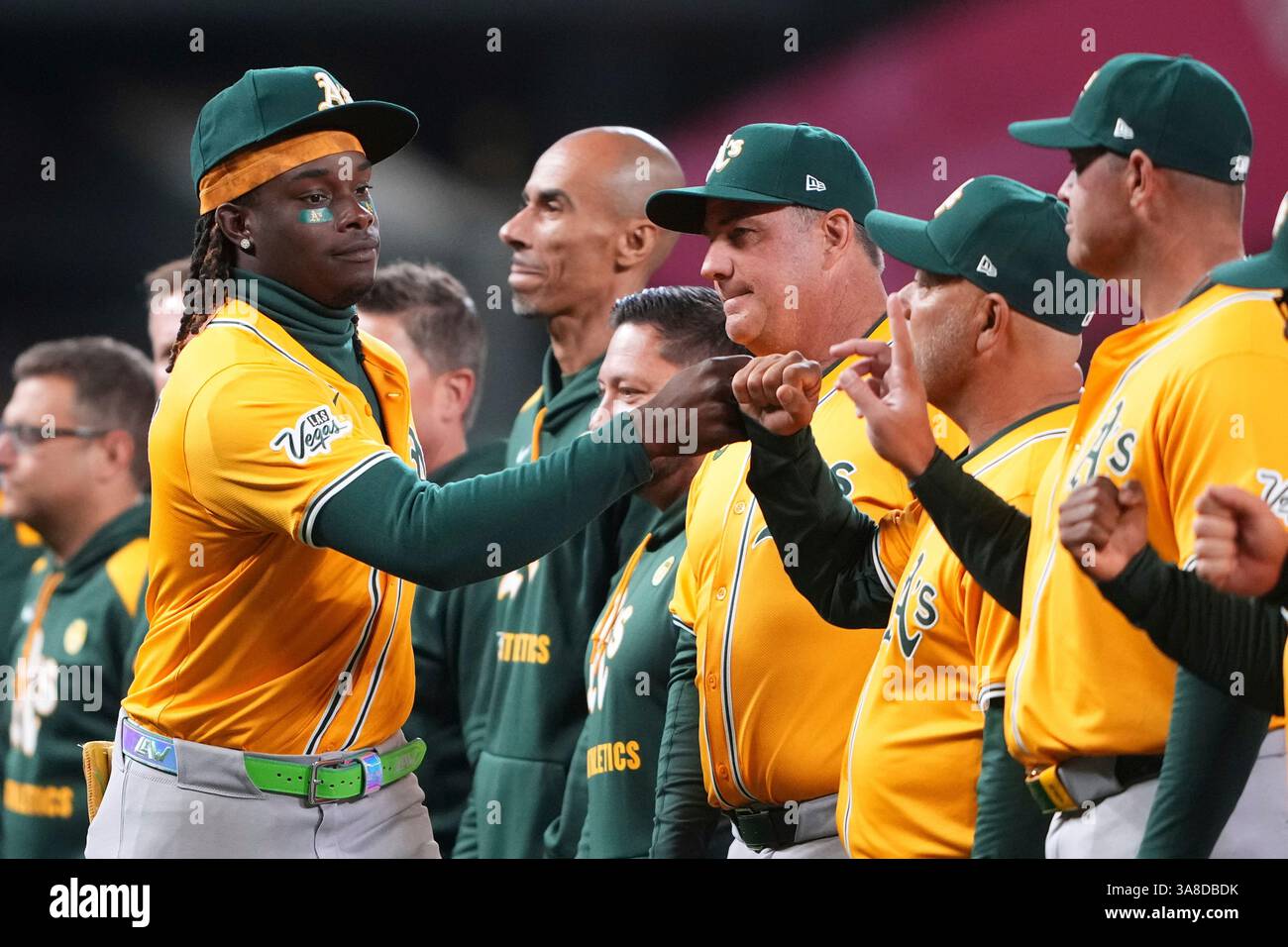 Athletics right fielder Lawrence Butler greets teammates and staff ...