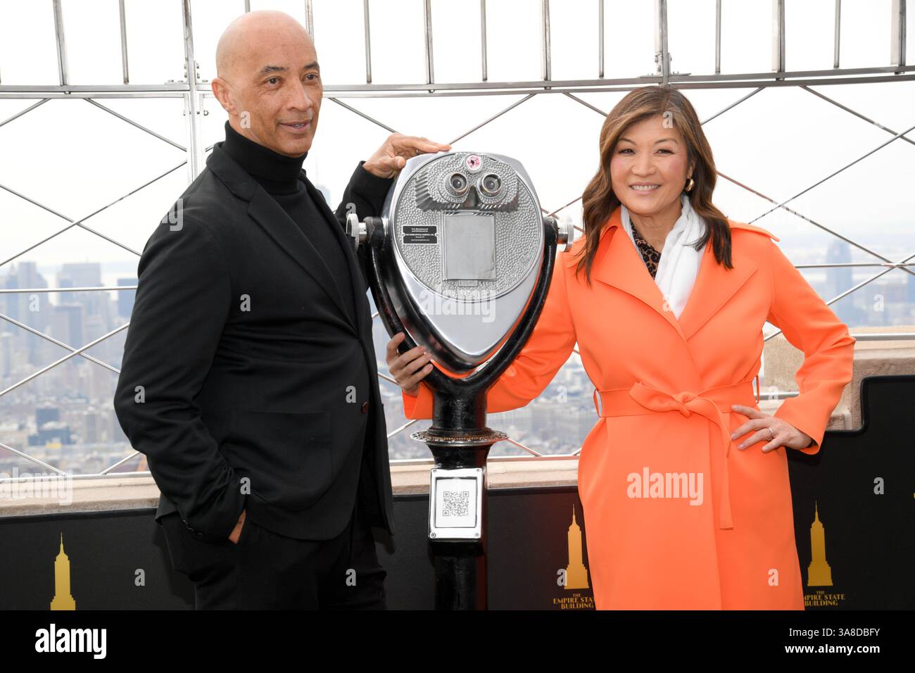 New York, USA. 28th Mar, 2025. Juju Chang (R) and Byron Pitts visit the Empire State Building in ...
