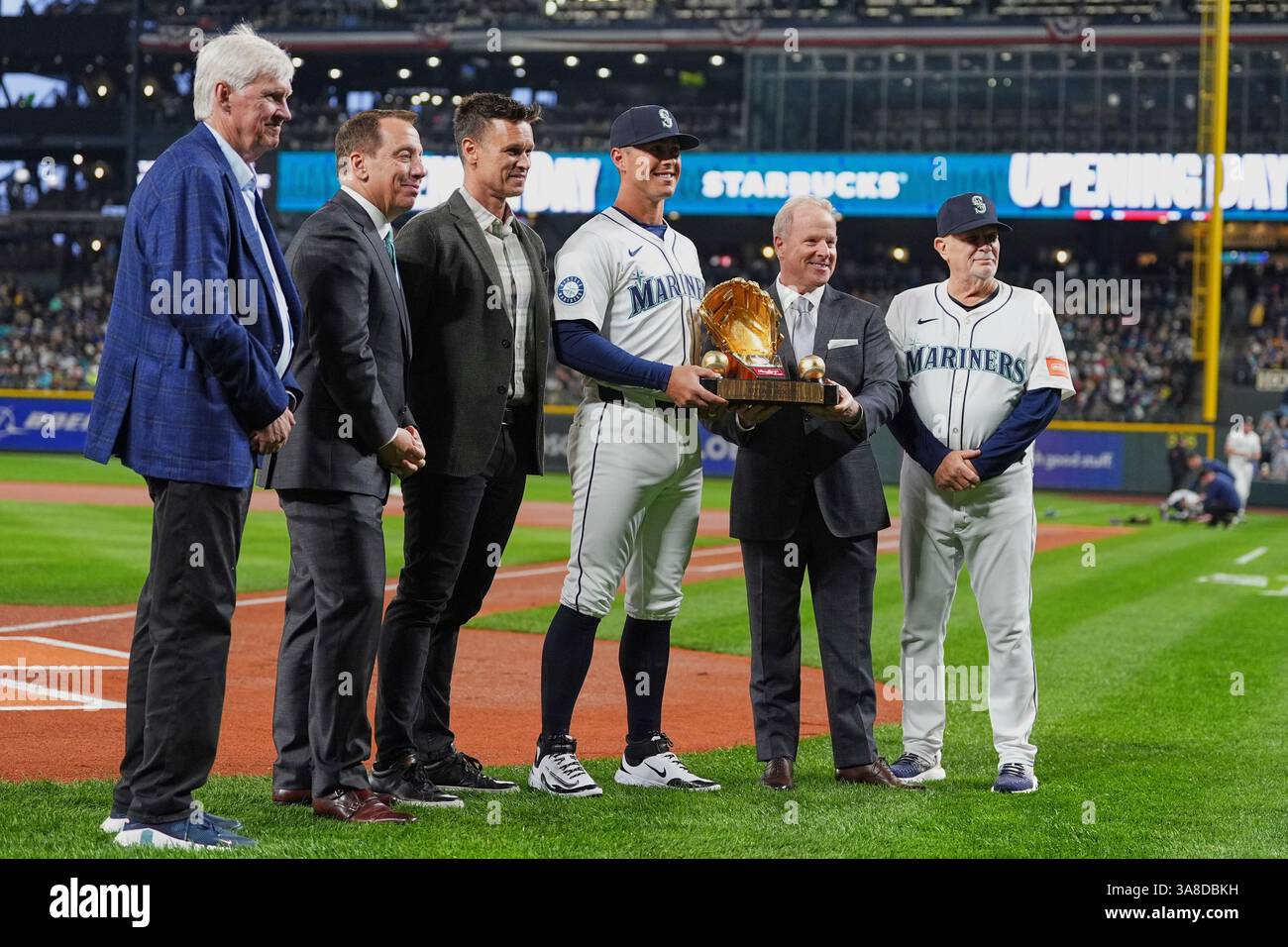 From left, Seattle Mariners owner John Stanton, president of business ...