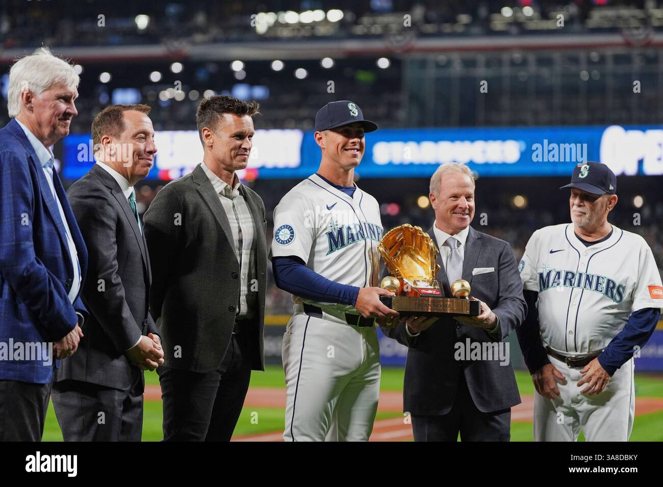 From left, Seattle Mariners owner John Stanton, president of business ...