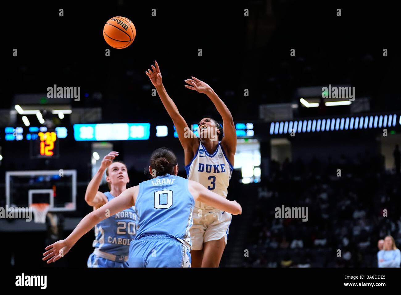 Duke guard Ashlon Jackson (3) shoots between North Carolina guard Lanie ...