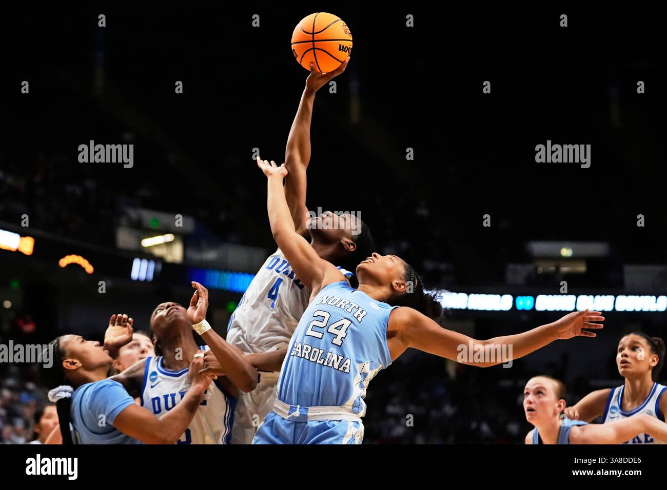 North Carolina guard Indya Nivar (24) and Duke guard Jadyn Donovan (4 ...