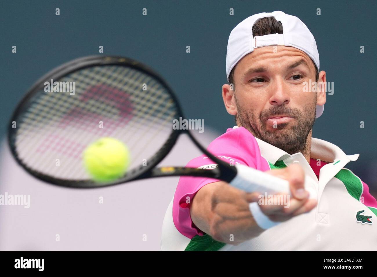 Grigor Dimitrov, of Bulgaria, plays a shot in his semifinal match ...