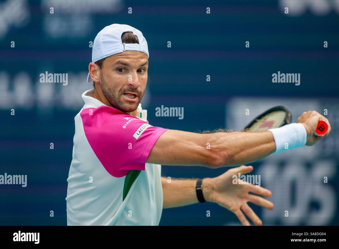 MIAMI GARDENS, FL - MARCH 28: Grigor Dimitrov (BUL) in action against ...