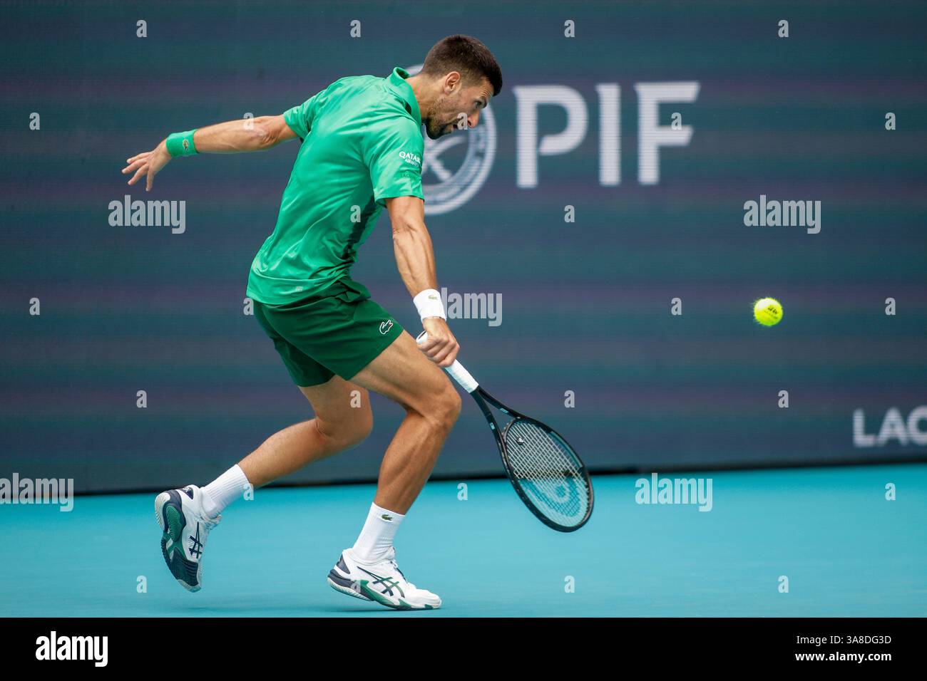 MIAMI GARDENS, FL - MARCH 28: Novak Djokovic (SRB) in action against ...