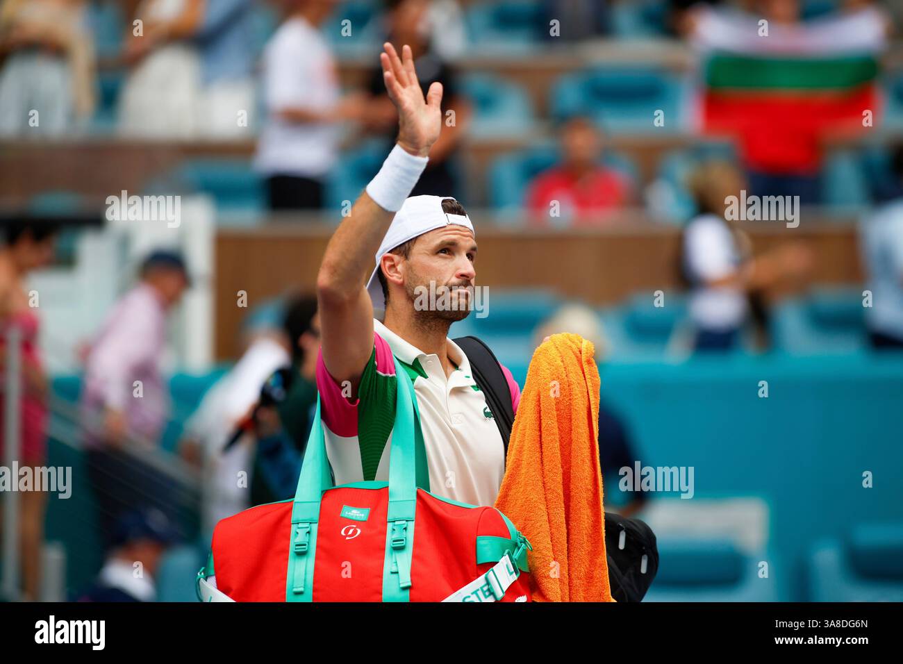MIAMI GARDENS, FL - MARCH 28: Grigor Dimitrov (BUL) waves after his ...