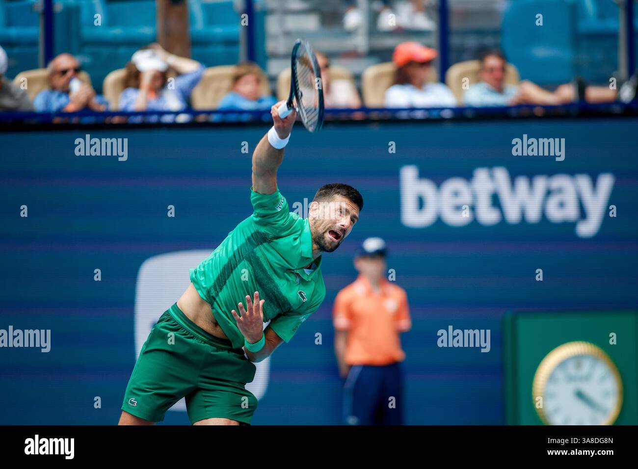 MIAMI GARDENS, FL - MARCH 28: Novak Djokovic (SRB) in action against ...