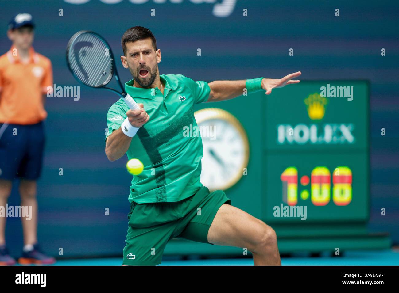 MIAMI GARDENS, FL - MARCH 28: Novak Djokovic (SRB) in action against ...